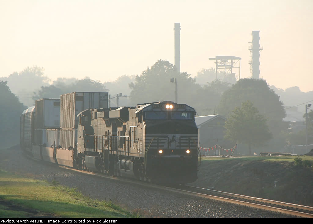 NS 211 At Sunrise Cuts Through Humid haze and Fog @ 0643 hrs